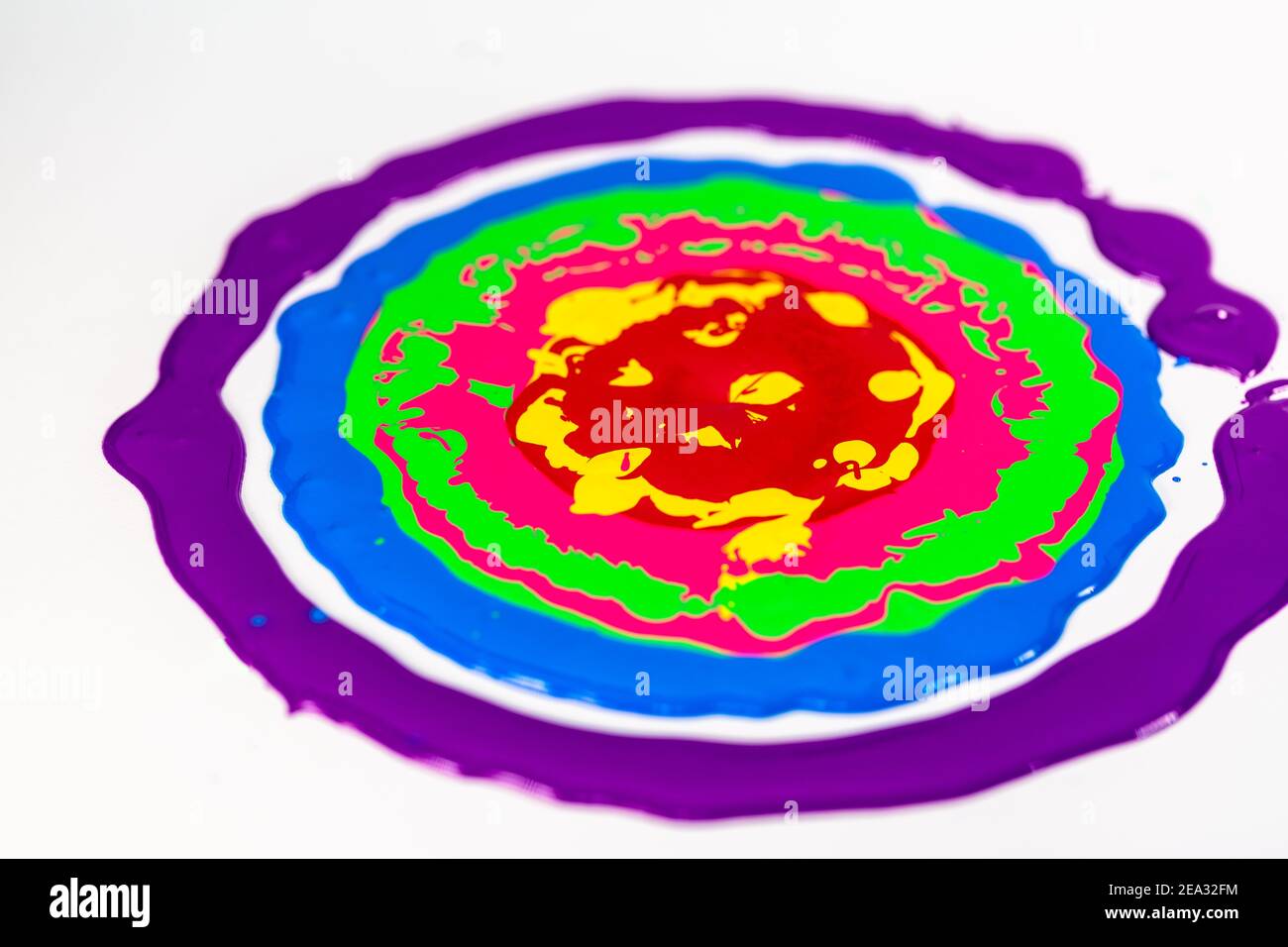 Various colors drop in lines on a white circle radial background and ...