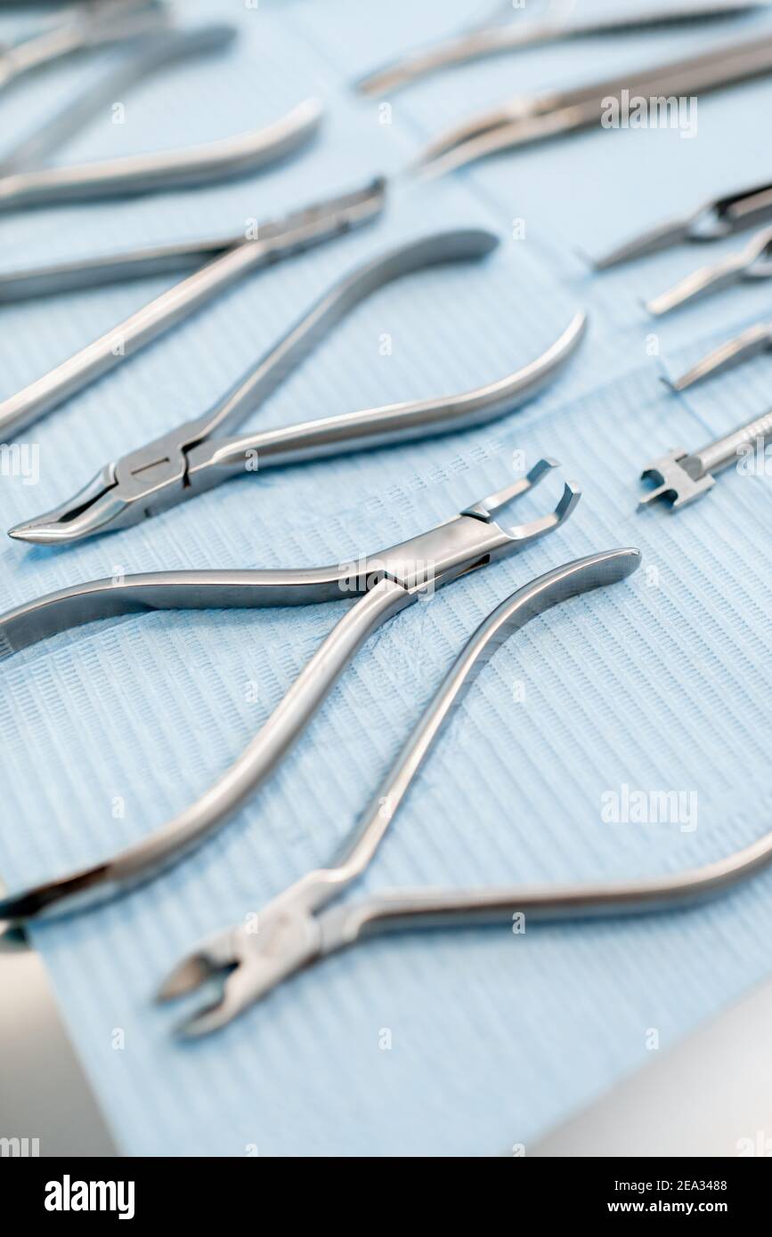 Dental tools for orthodontic treatment lying on the table Stock Photo ...