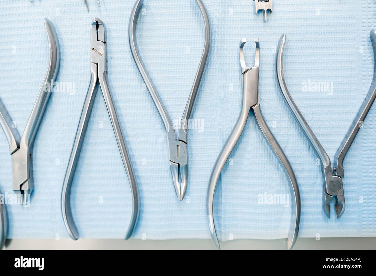 Dental tools for orthodontic treatment lying on the table Stock Photo ...