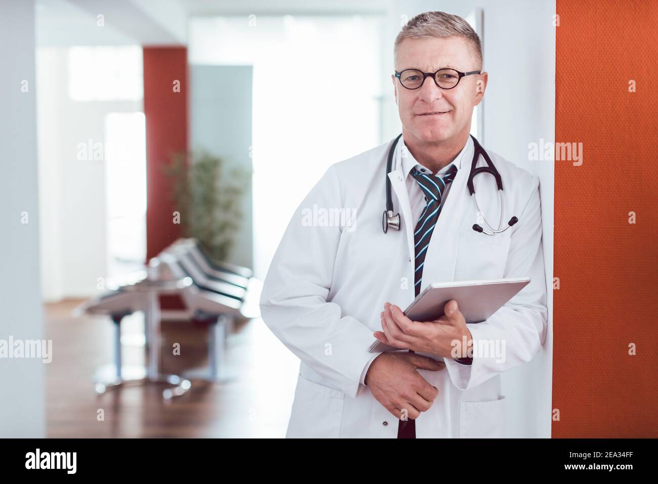 Doctor in his practice Stock Photo - Alamy