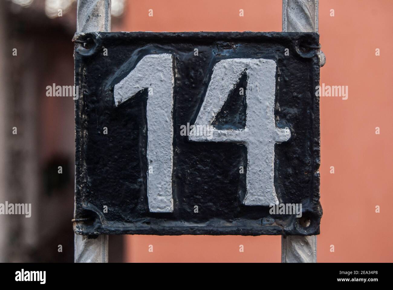 Old retro weathered cast iron plate with number 14 closeup Stock Photo ...