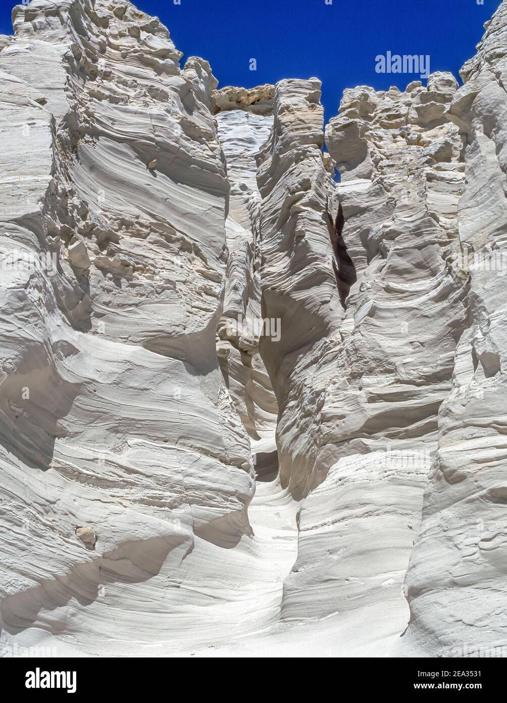 eroded walls of volcanic ash and pumice deposits in the foothills of ...