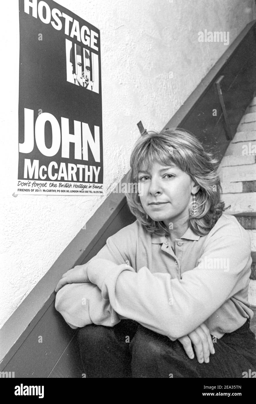 HARPENDEN - ENGLAND. Jill Morrell poses next to a poster of John ...