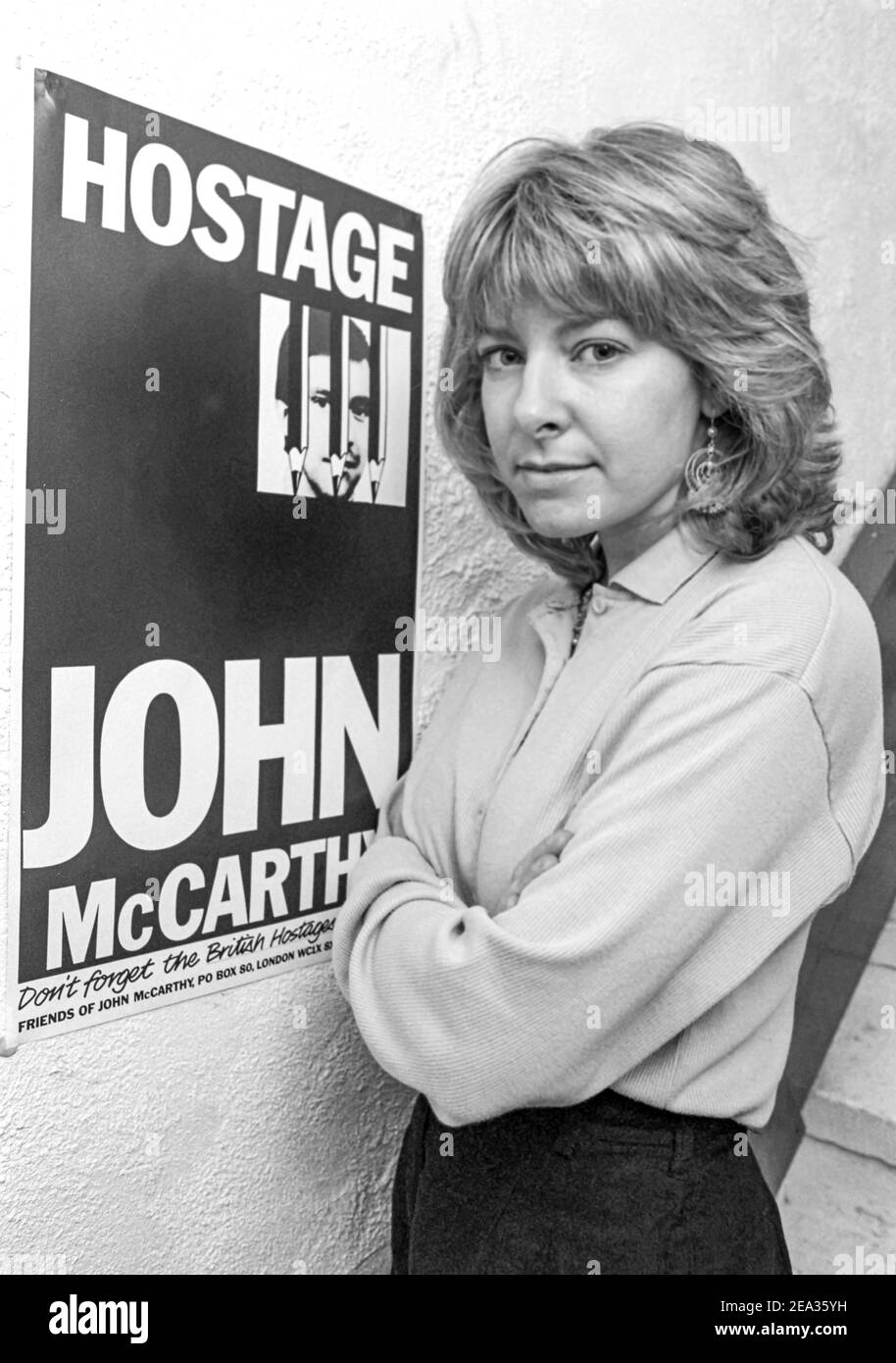 HARPENDEN - ENGLAND. Jill Morrell poses next to a poster of John ...