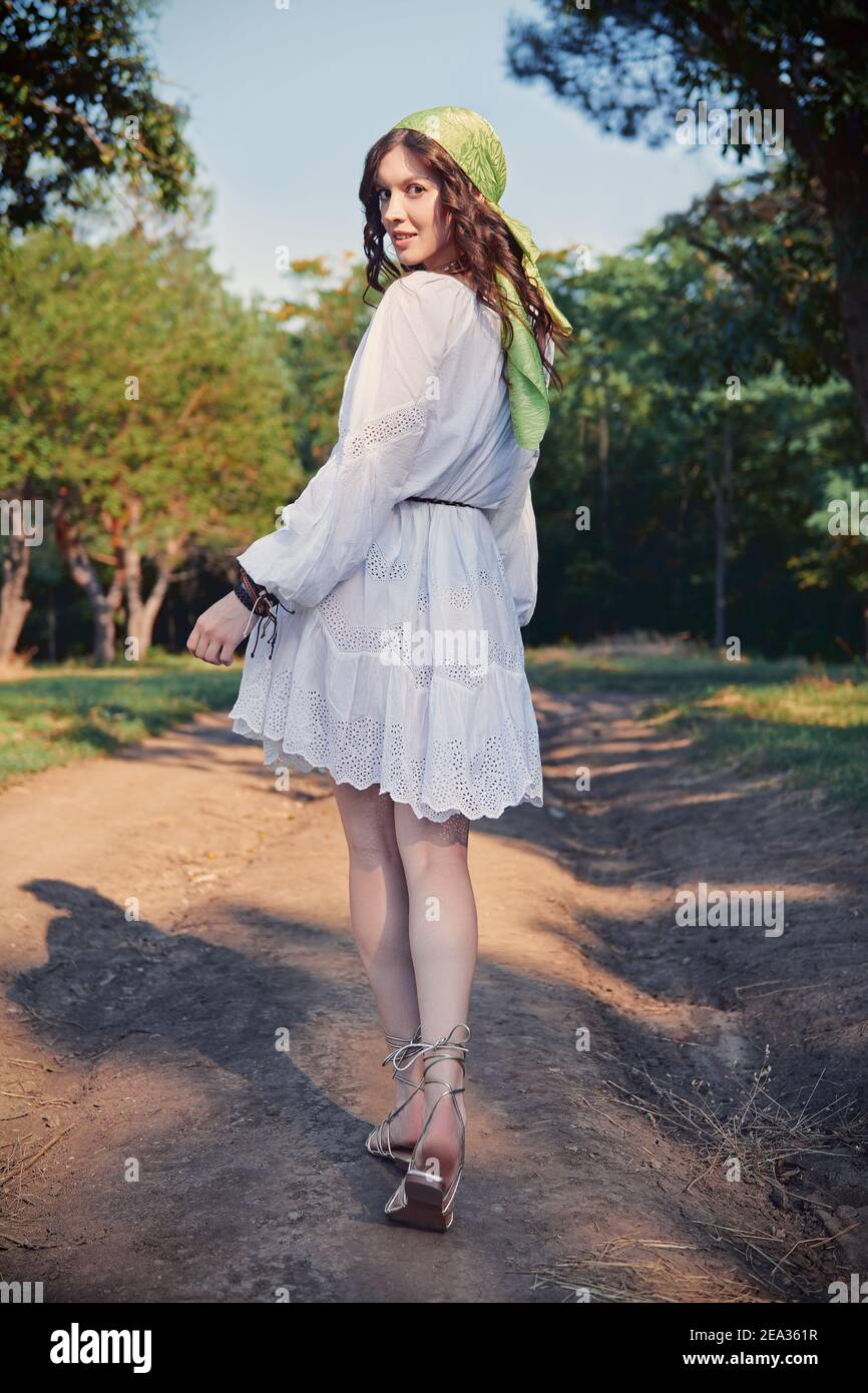 Outdoor fashion: the beautiful young boho (hippie) girl in grove ...