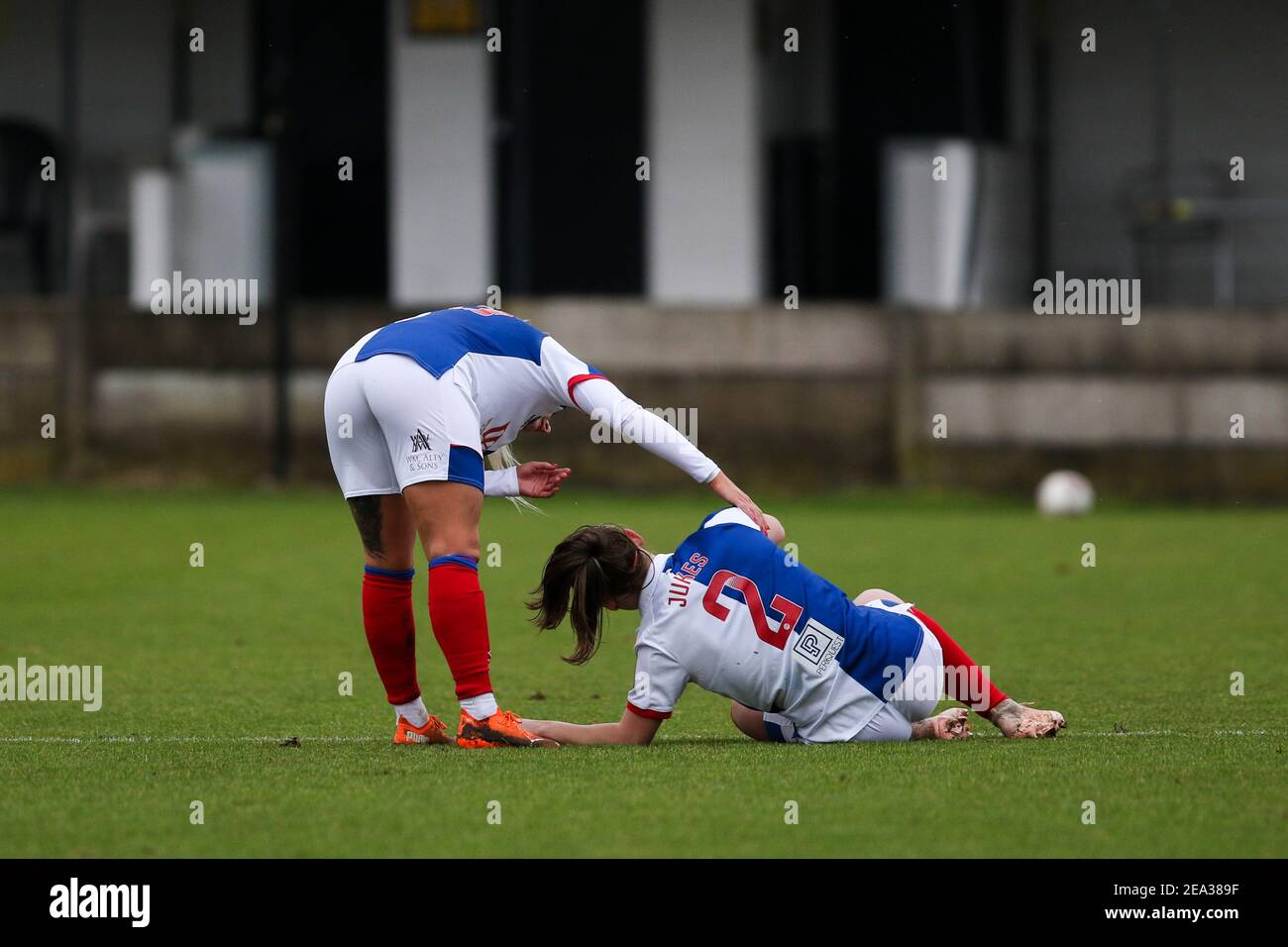 Ali Johnson (#20 Blackburn Rovers) checks on Chelsey Jukes (#2 ...