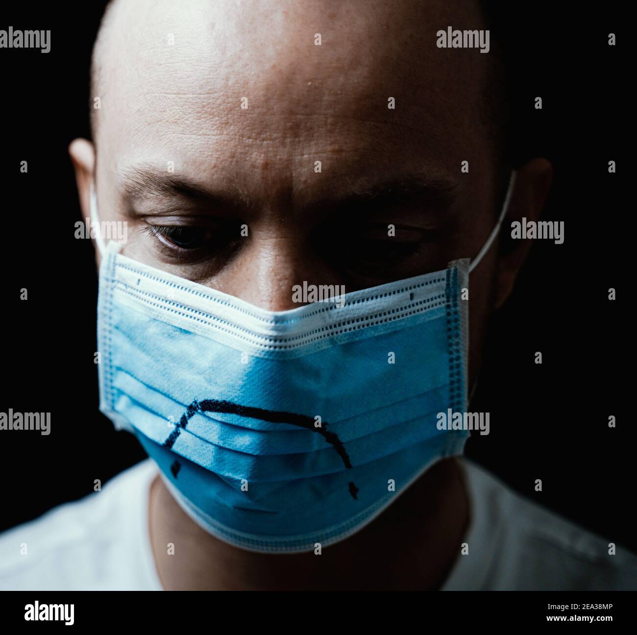 Sad man disposable mask hi-res stock photography and images - Alamy