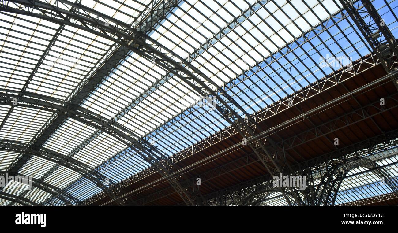 Massive glas roof structures - inside a train station Stock Photo - Alamy