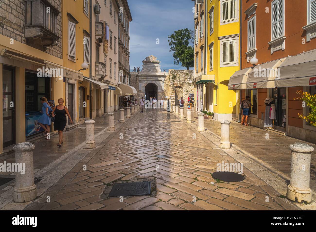 Zadar, Croatia, July 2019 Tourists visiting beautiful narrow streets of ...