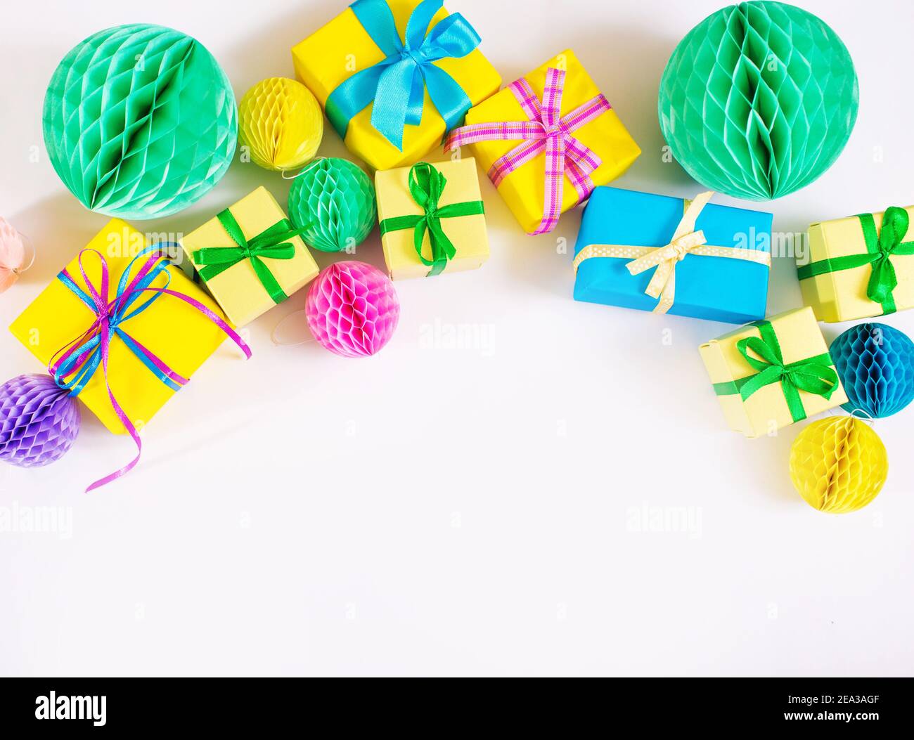 lots of colorful boxes on a white background. Top view Stock Photo - Alamy