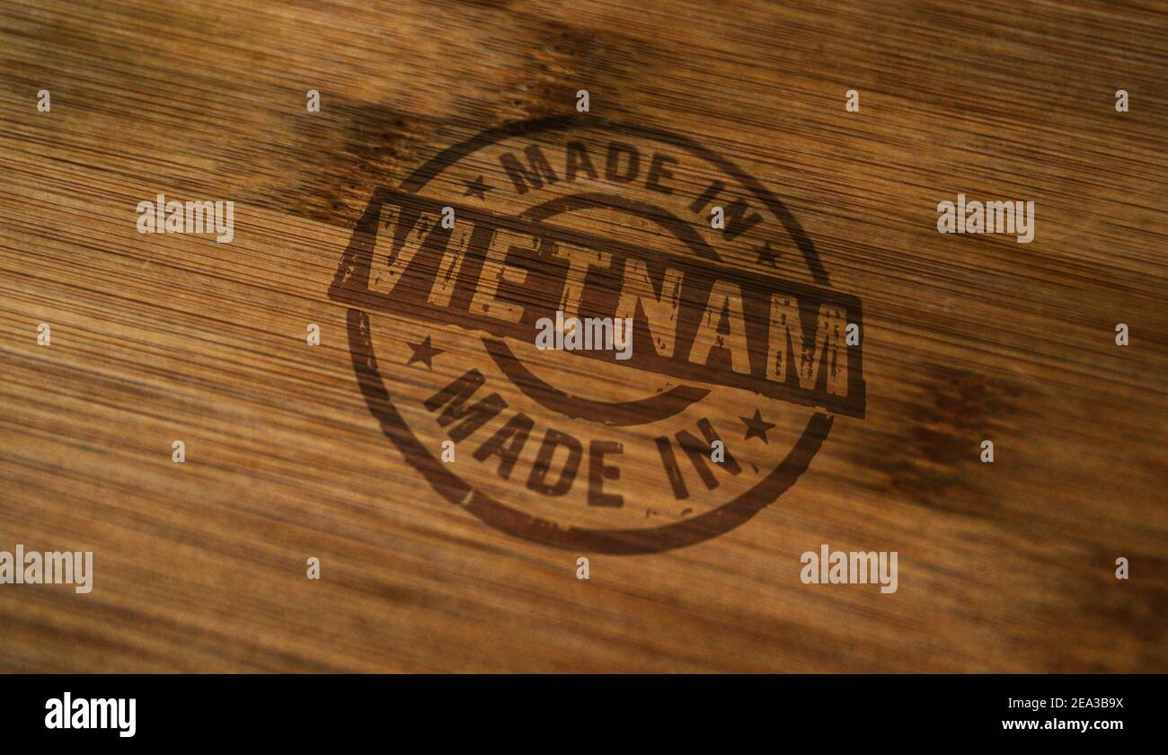 Made in Vietnam stamp printed on wooden box. Factory, manufacturing and ...