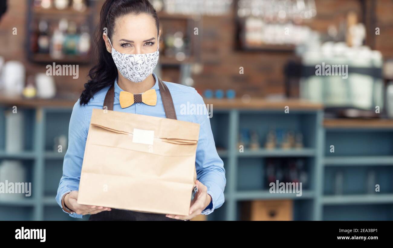 Handing bags hi-res stock photography and images - Alamy