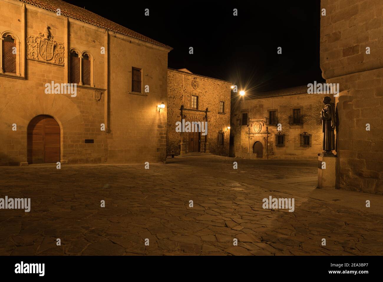 Night landscape of the old city of Cáceres with stone houses of the ...