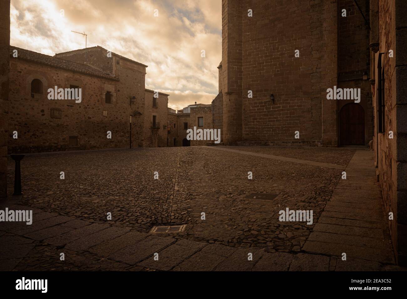 Street of the monumental old town of Cáceres city at sunset, UNESCO ...
