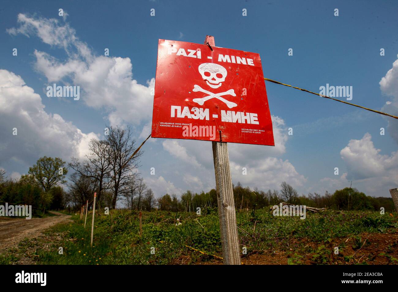 Minefield sign with a life-threatening warning Stock Photo - Alamy