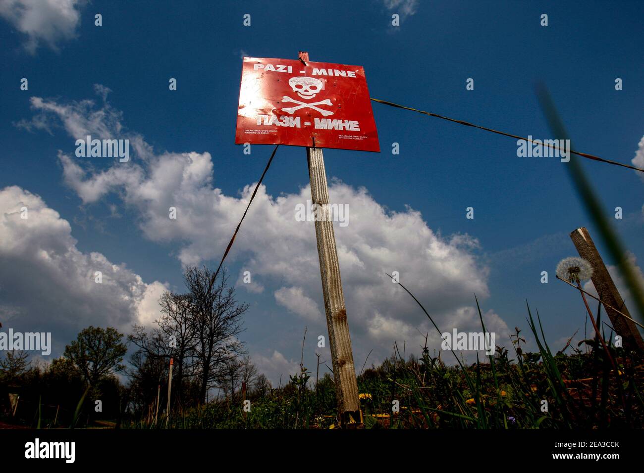 Minefield sign with a life-threatening warning Stock Photo - Alamy