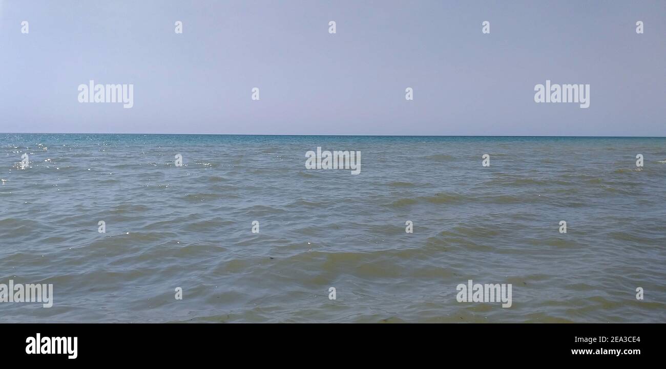 landscape: sea with small waves and distant horizon Stock Photo - Alamy