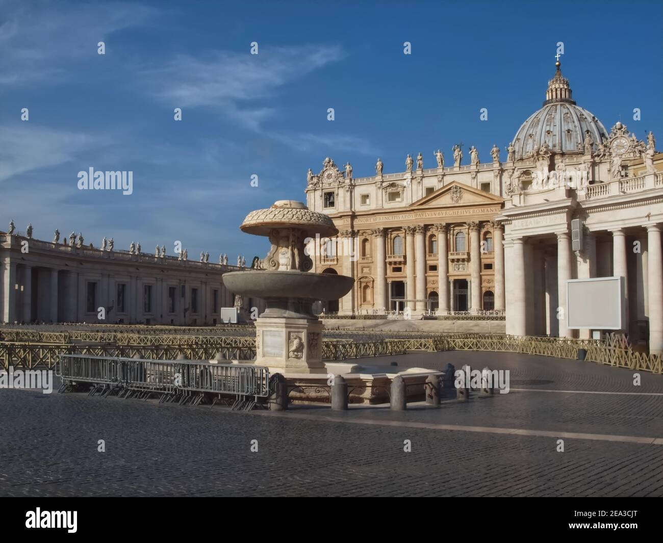 Empty St. Peters square with Saint Peter basilica in Rome in Italy with ...