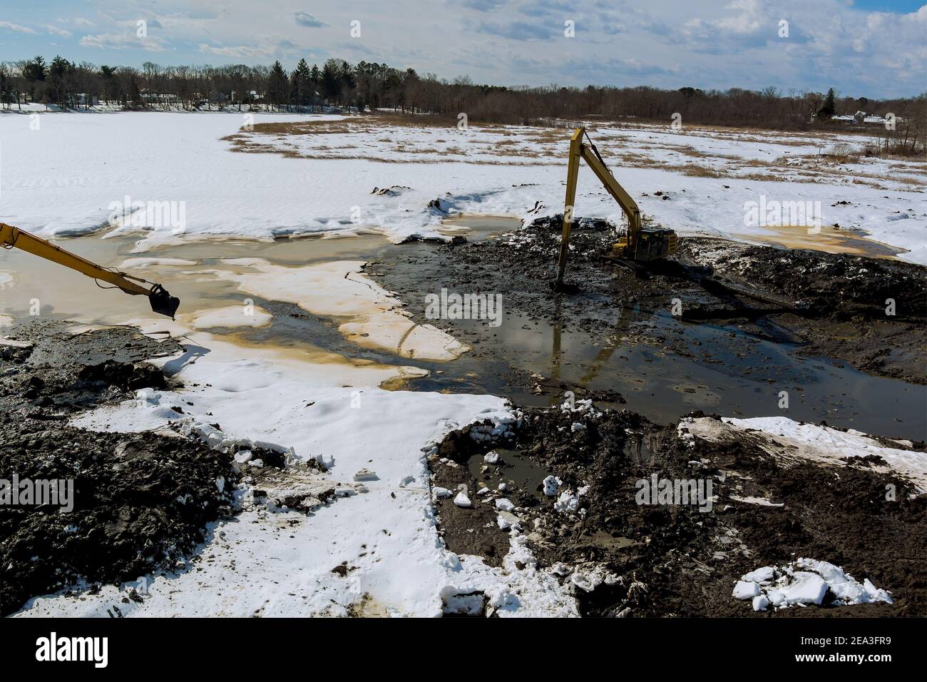 Excavator bucket is soak in water dredge a cleaning the bottom of the ...