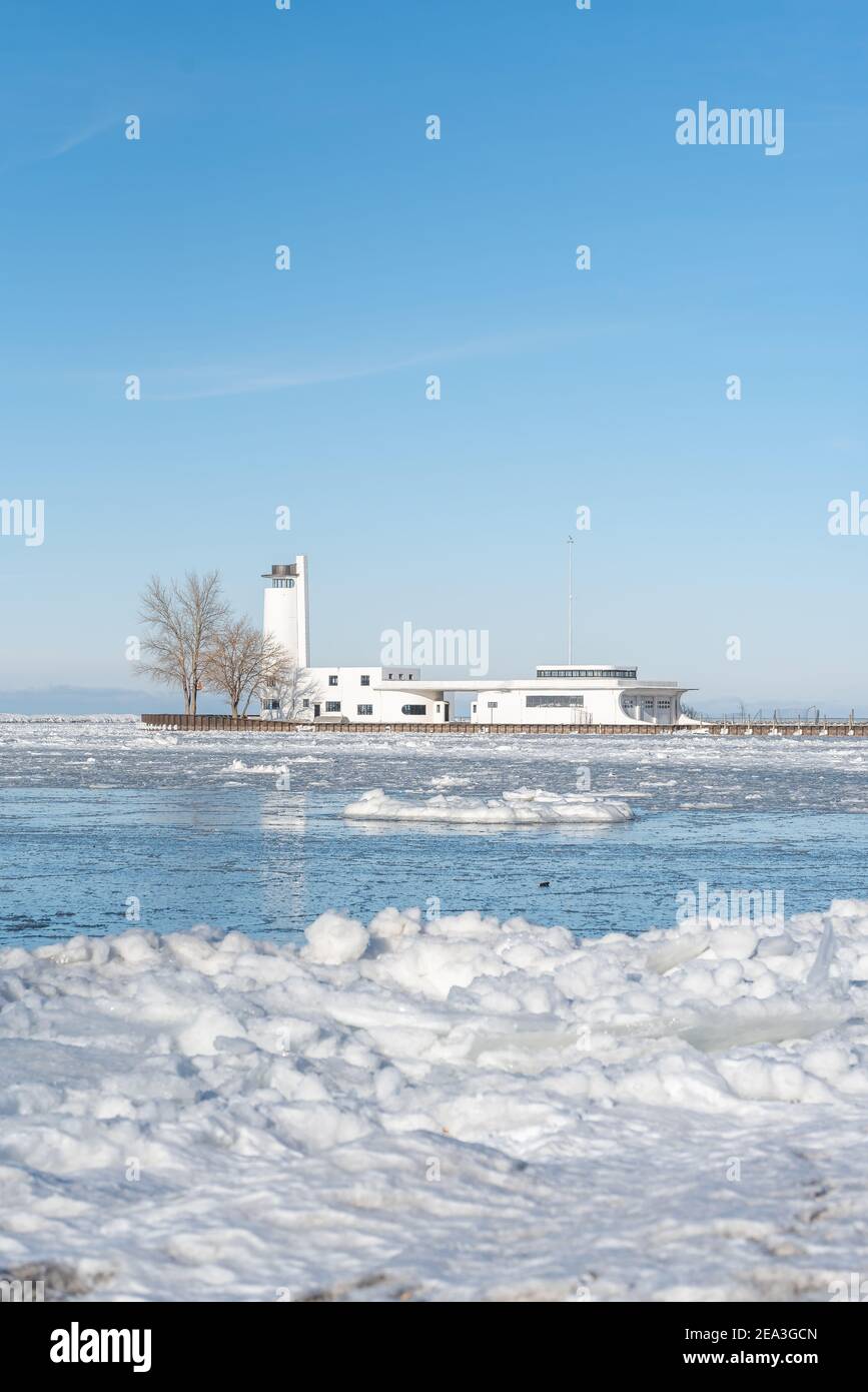 Old Coast Guard Station during winter time with a frozen lake erie ...