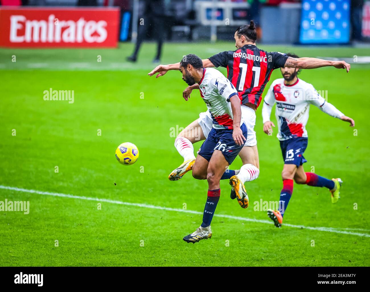 Zlatan Ibrahimovic of AC Milan and Koffi Djidji of FC Crotone are seen ...