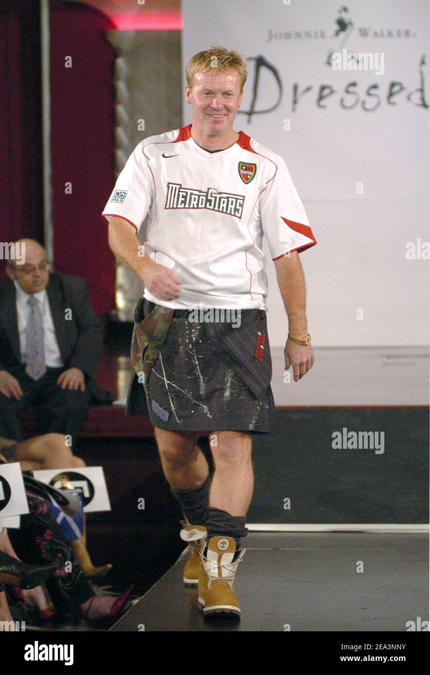 Scottish soccer legend Mo Johnston walks the runway at Scottish evening ...