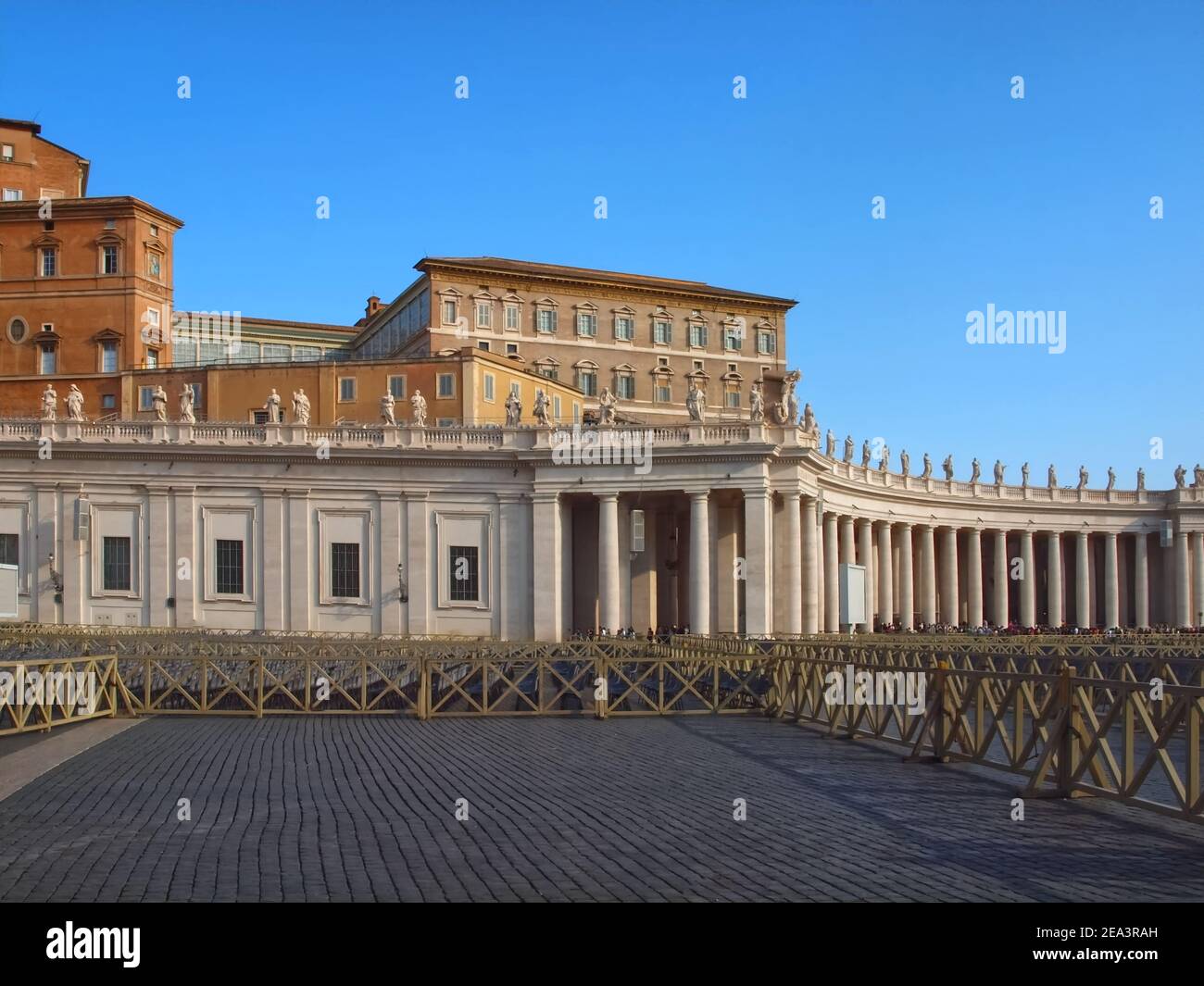 Empty St. Peters square in Rome in Italy with blue sky Stock Photo - Alamy