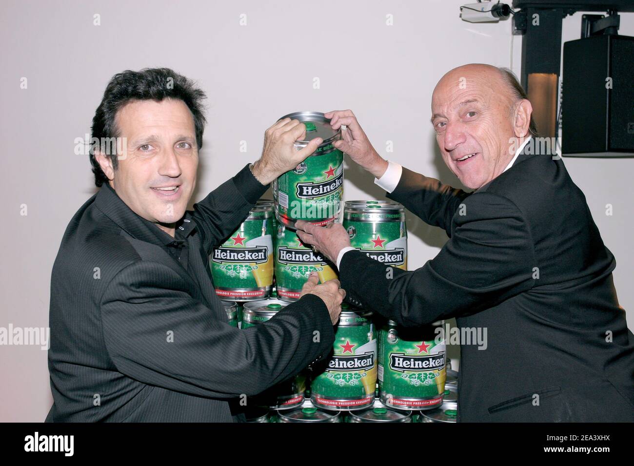 French TV presenter Michel La Rosa (L) and French journalist Pierre ...