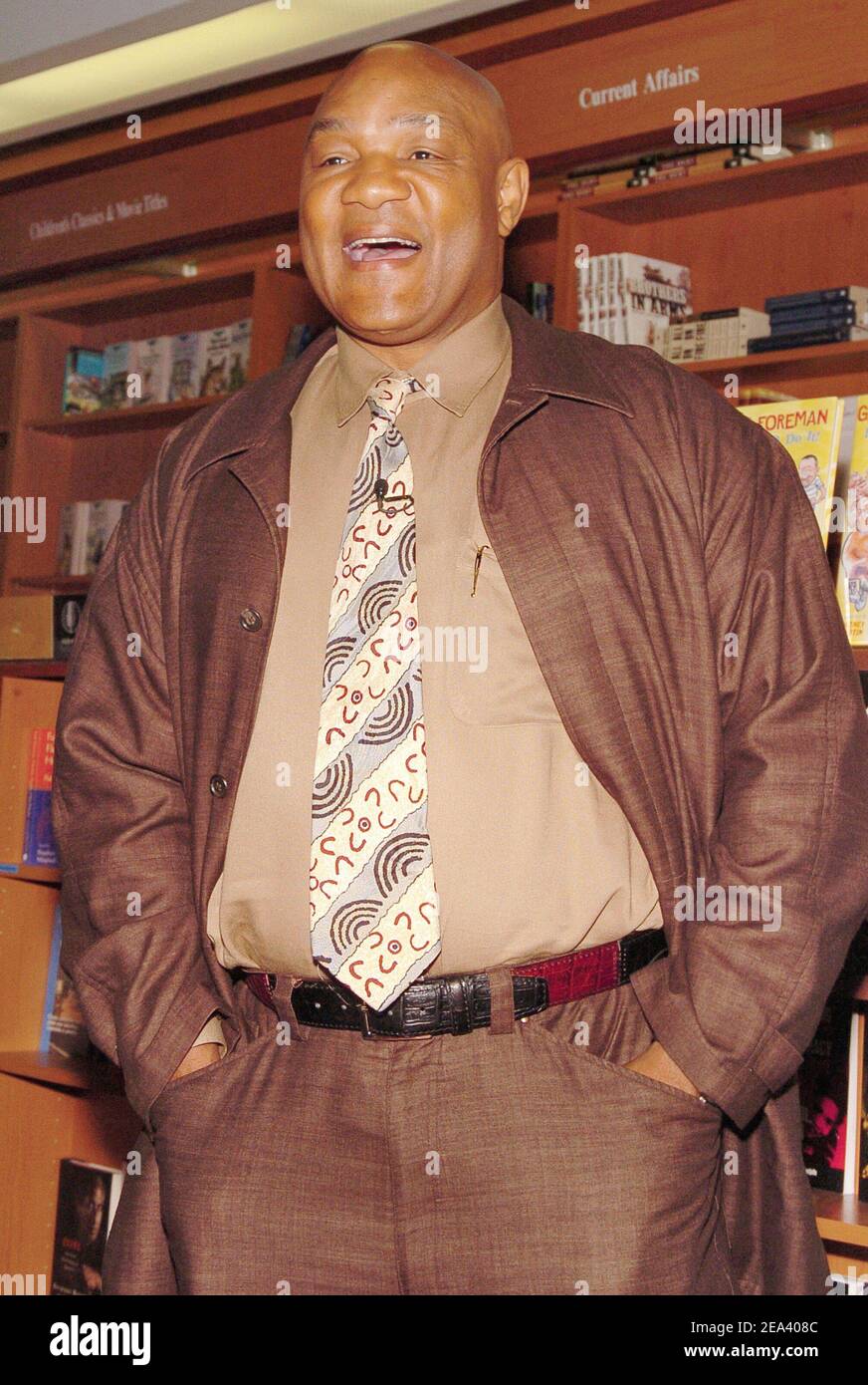 Former Boxing Heavyweight World Champion George Foreman signs his ...