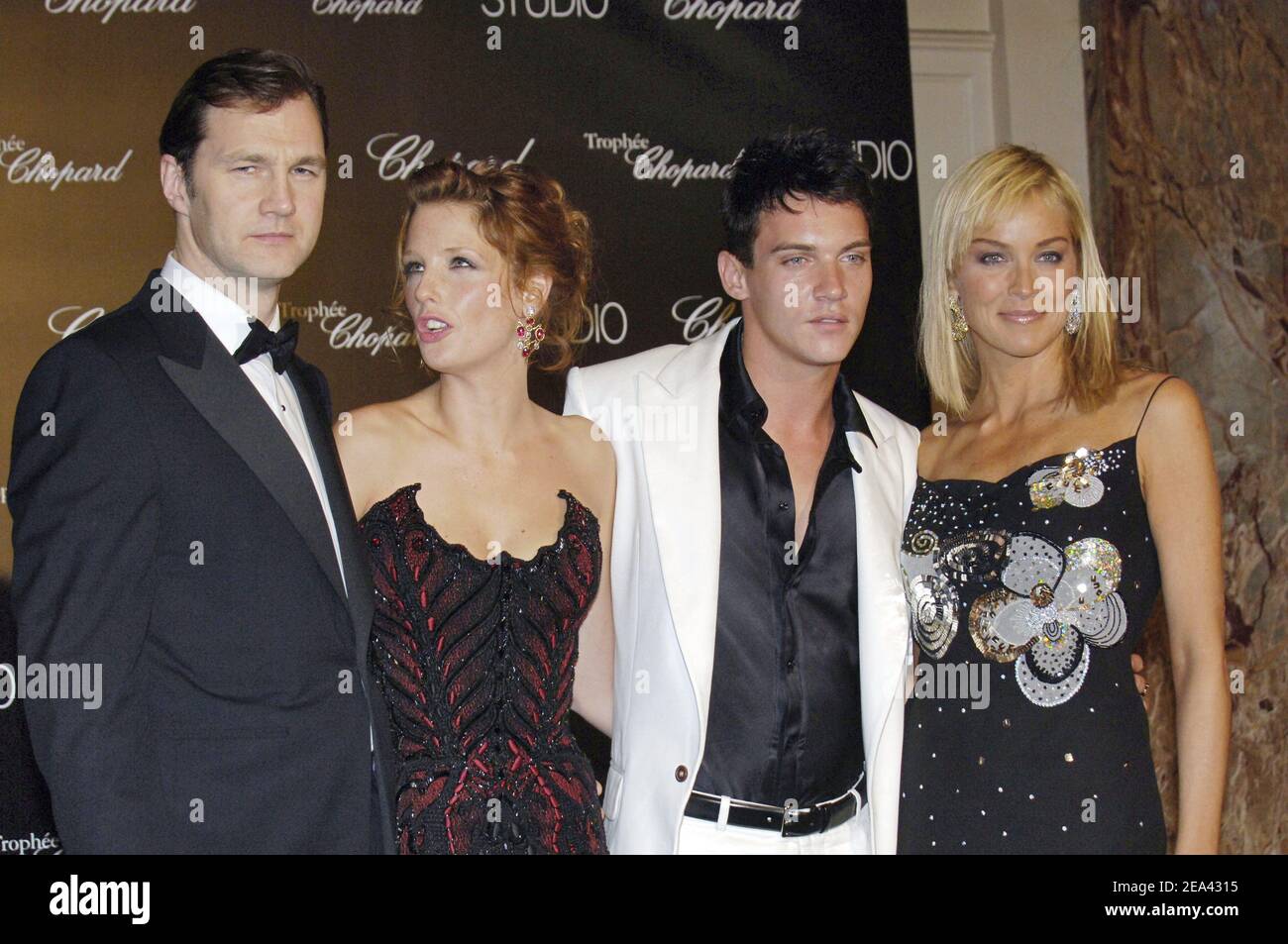 Sharon Stone poses for the photographers with David Morrissey and 2005 ...