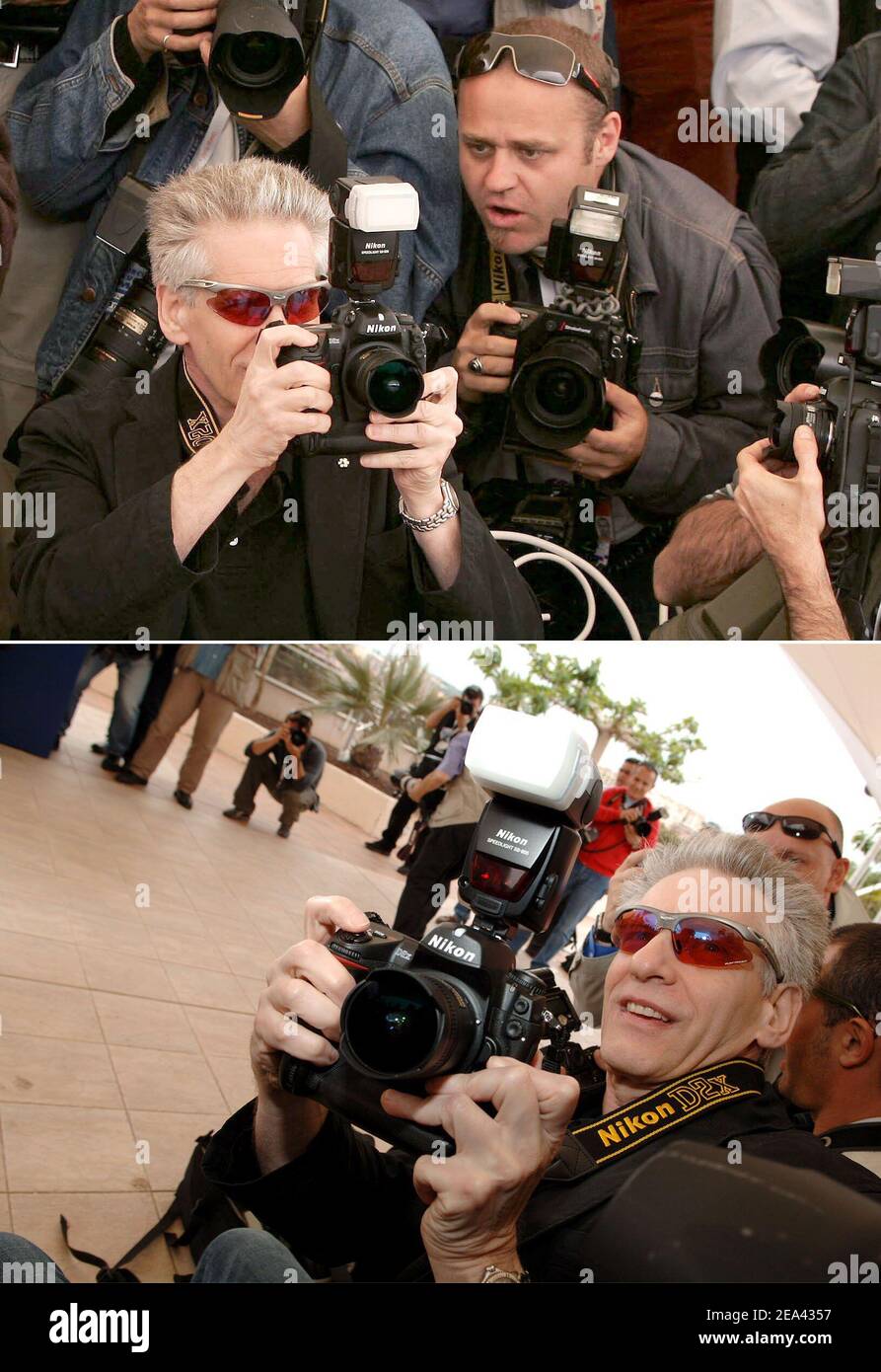 Canadian director David Cronenberg takes photos of photographers during ...