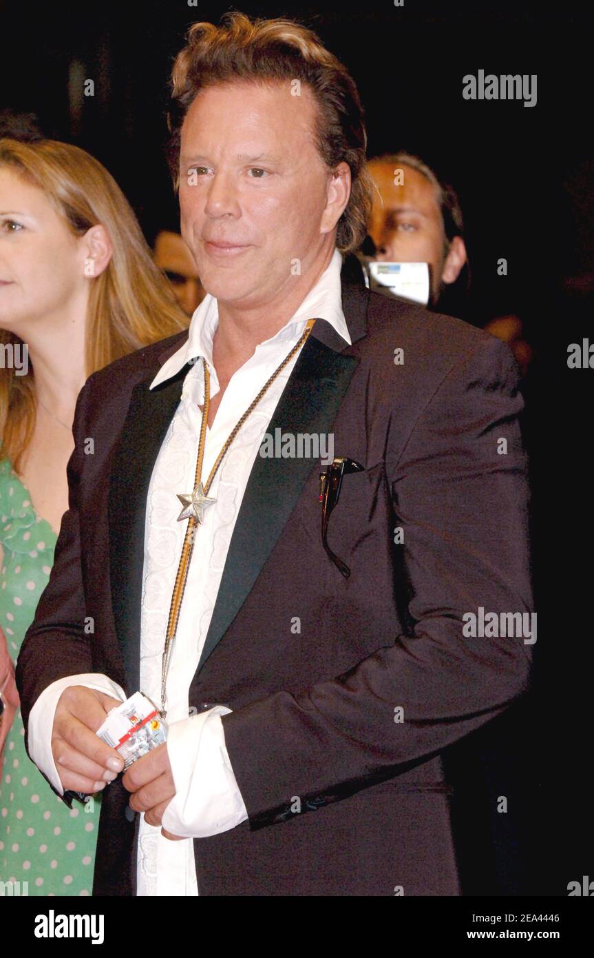 Mickey Rourke arrives for the screening of the film 'Sin City' directed ...