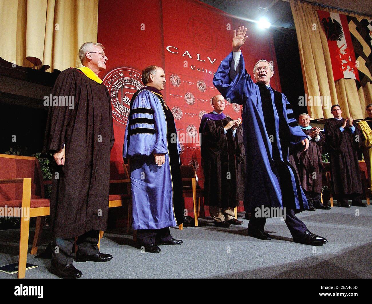 President George W. Bush salutes the crowd at Calvin College on May 21 ...