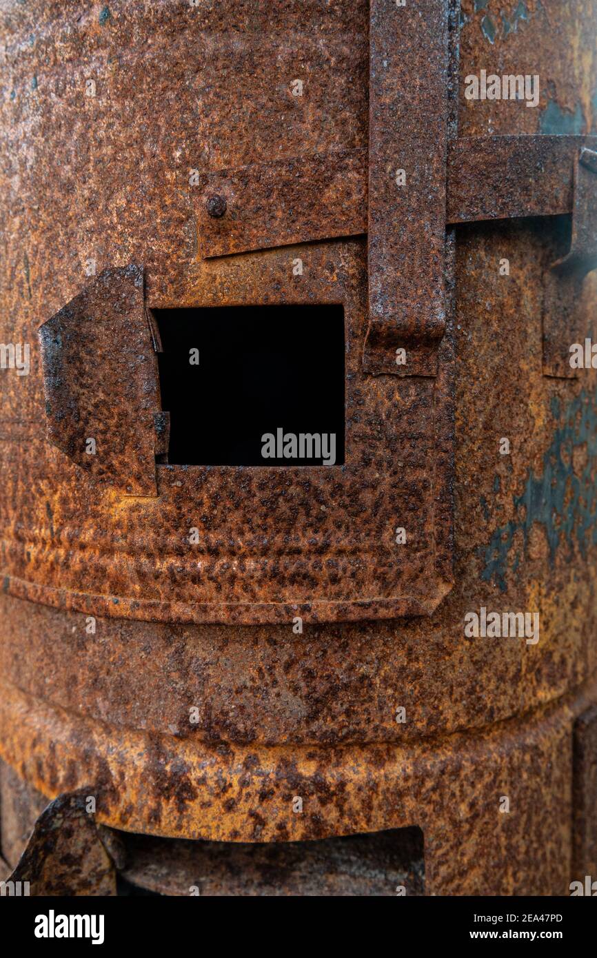 Very old stove covered with rust after the fire Stock Photo - Alamy