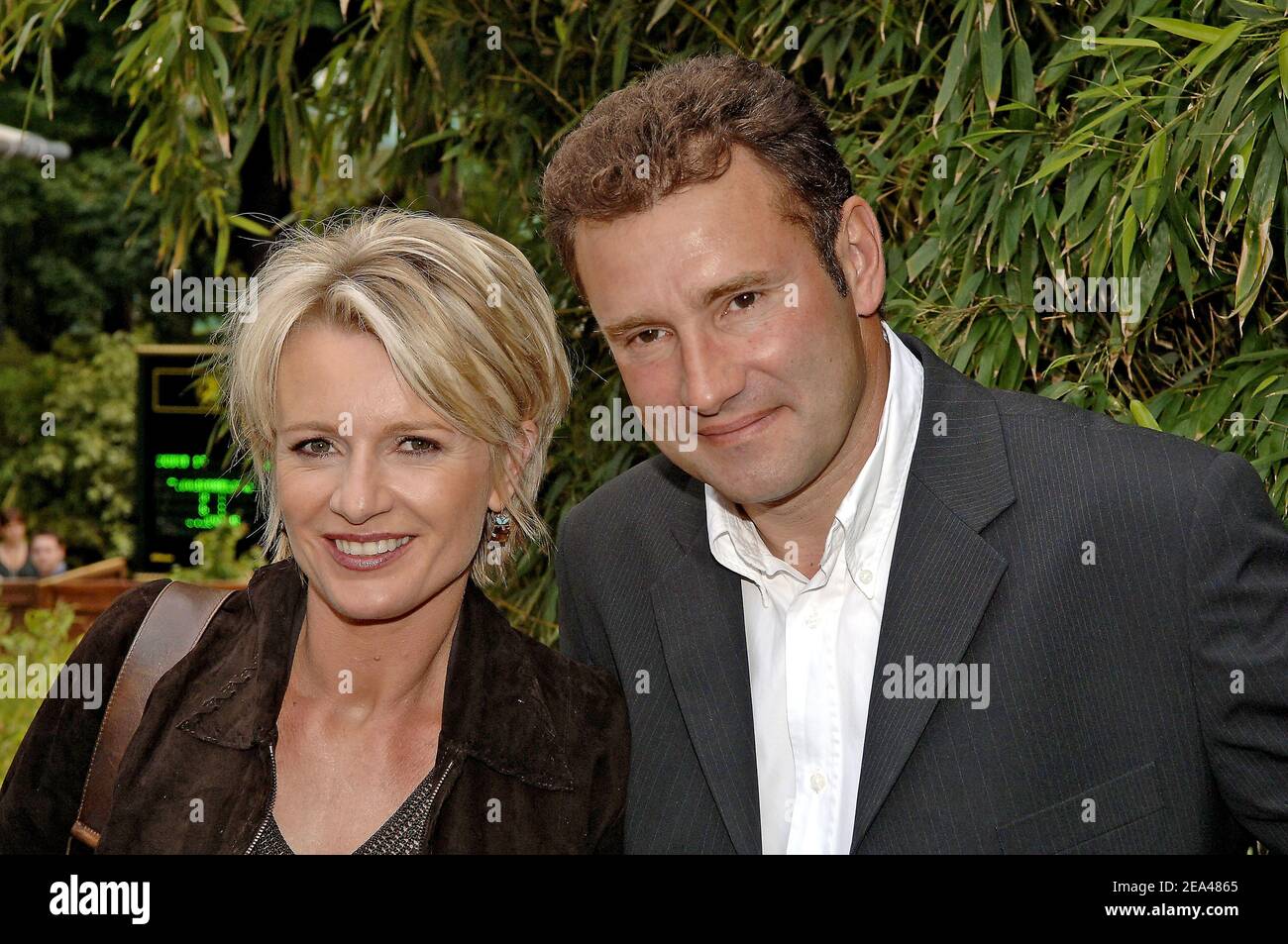 French TV presenter Sophie Davant and her husband Pierre Sled pose as ...