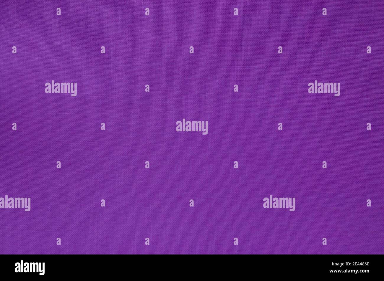 purple textile background. Close up view of purple fabric texture and ...