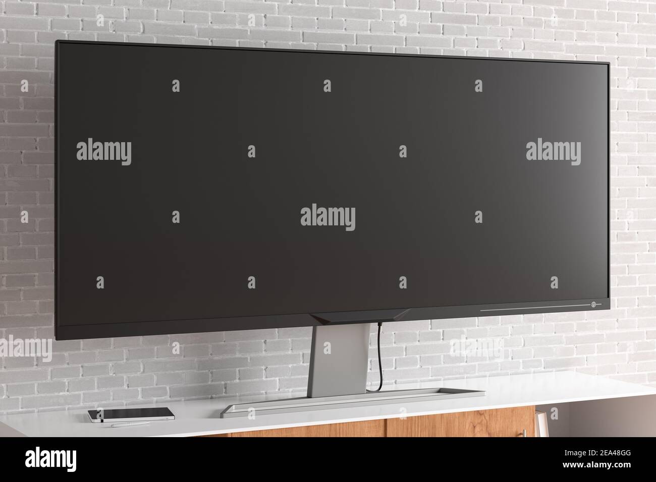 TV wide screen on the TV stand near white brick wall in living room ...