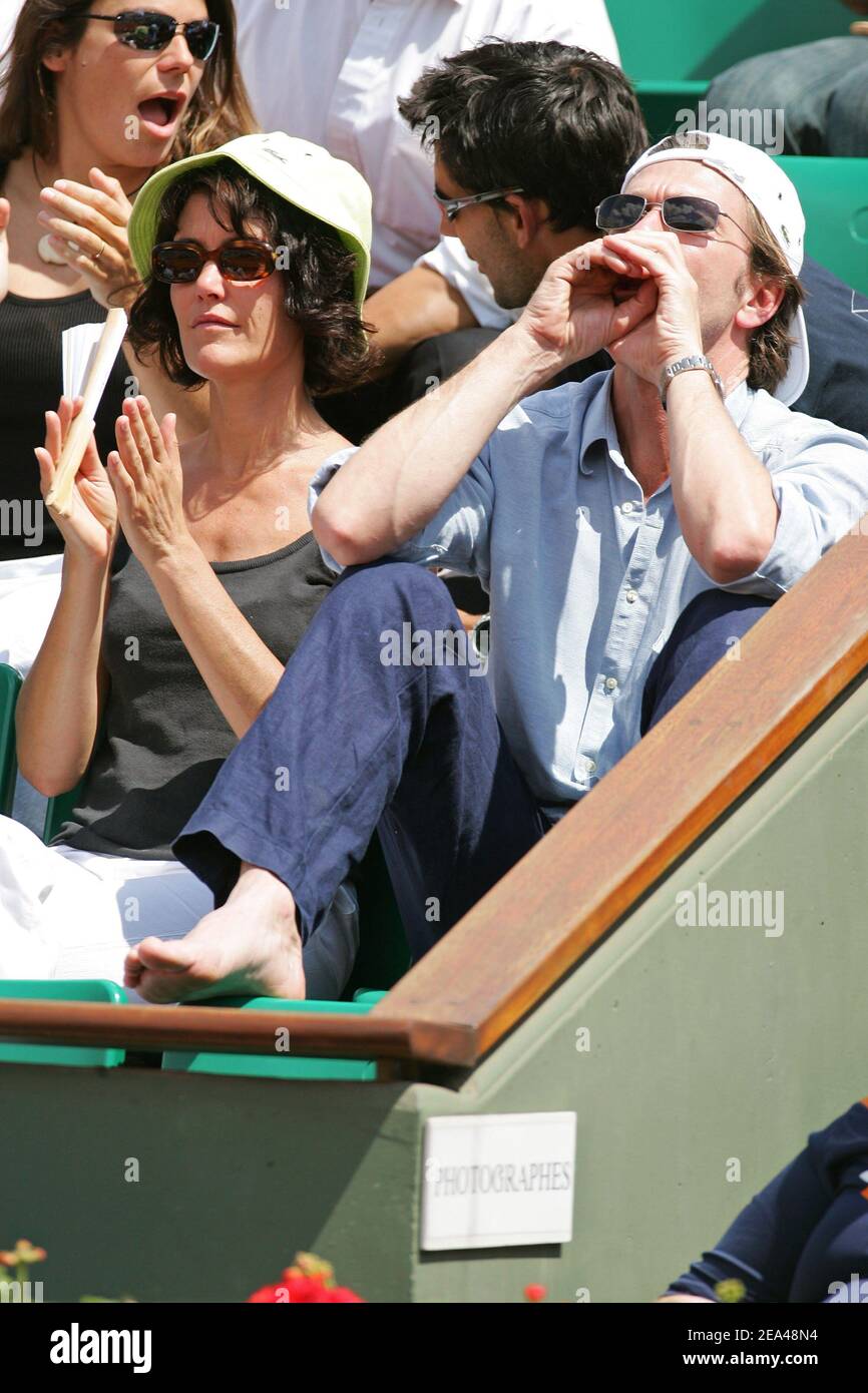 French actors Caroline Tresca and Philippe Caroit attend the match ...