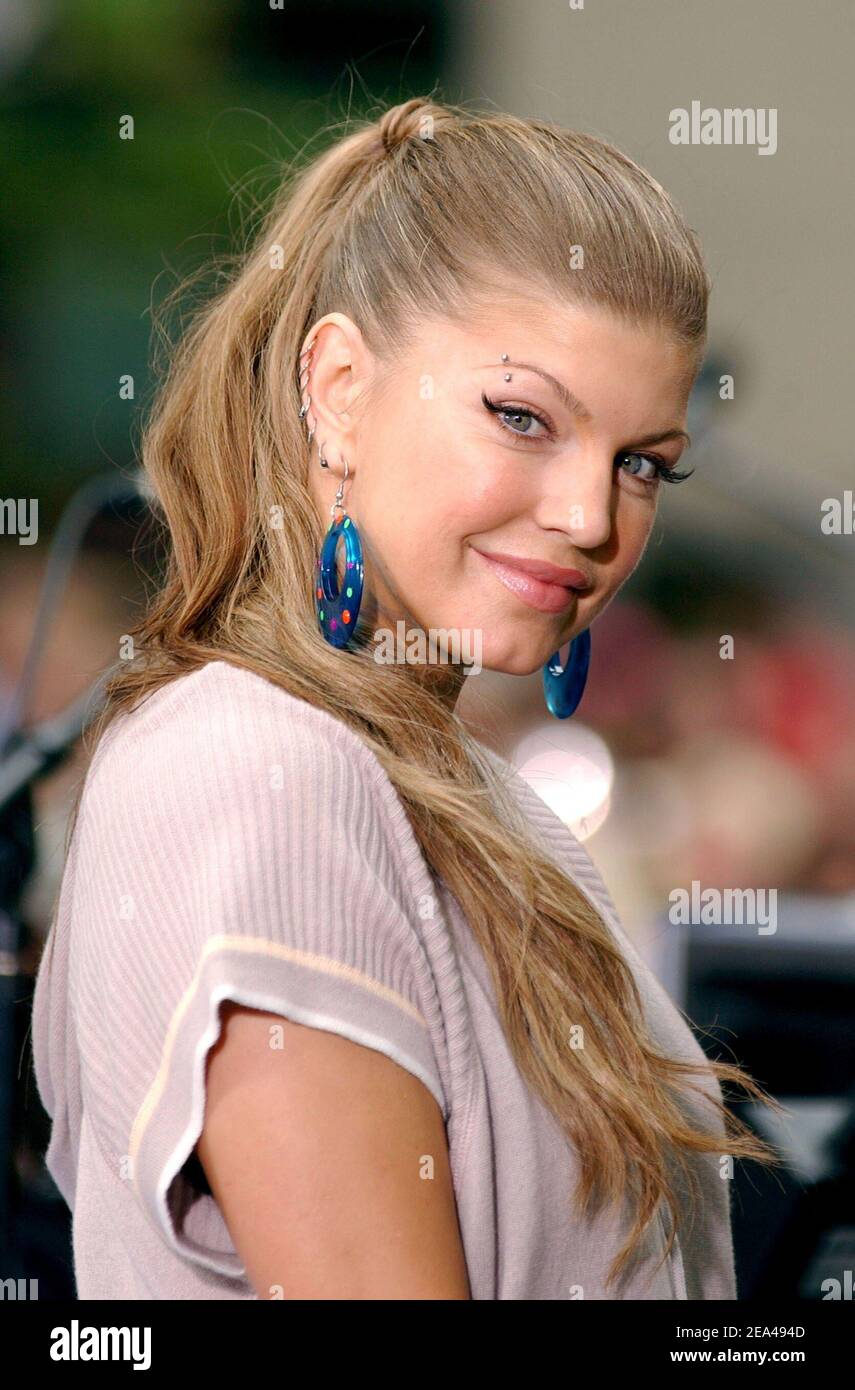 Fergie of the Black Eyed Peas plays with photographers on the Plaza at ...
