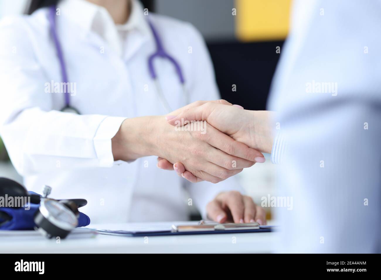 Doctor and the patient shake hands closeup Stock Photo - Alamy