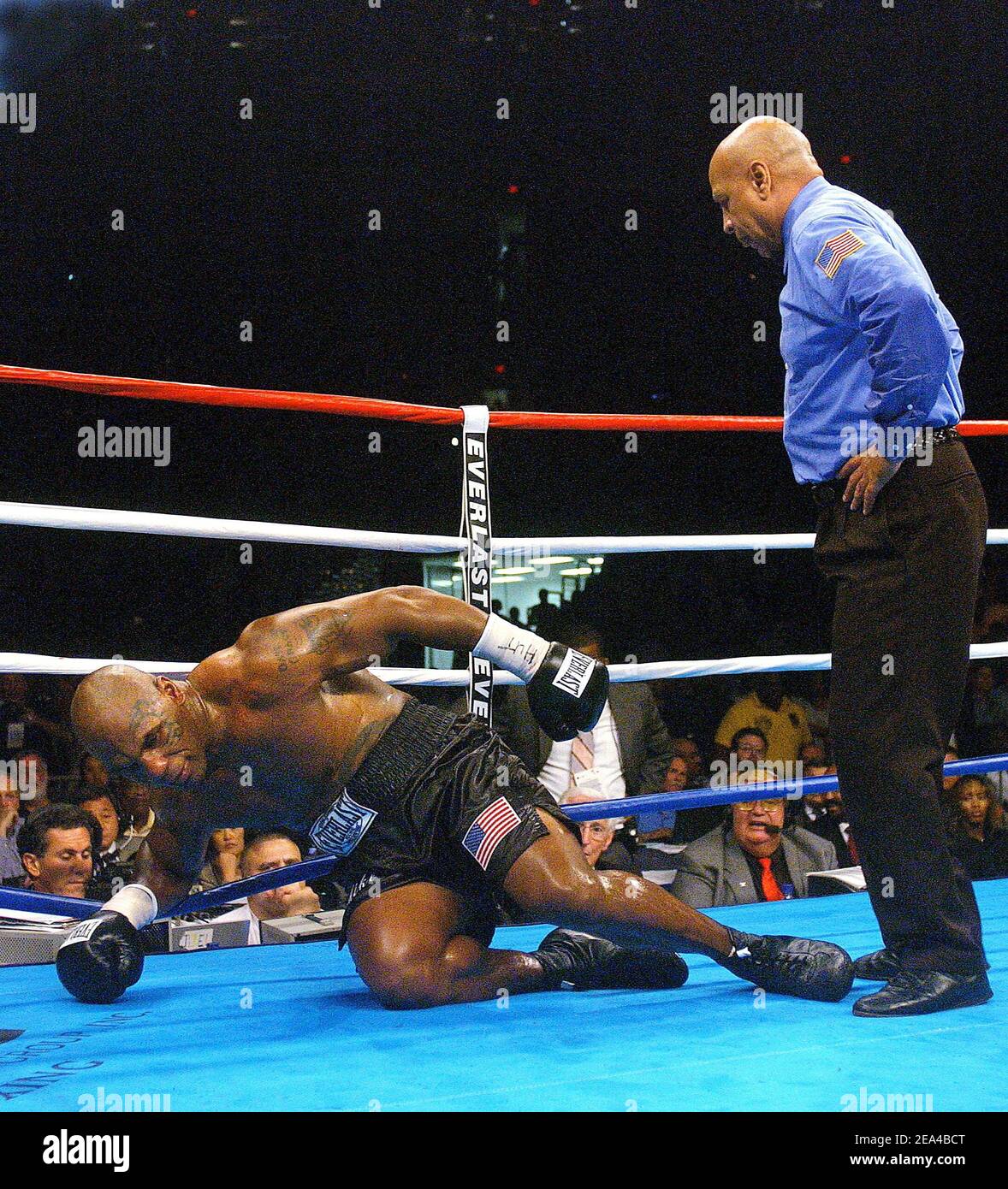 Referee, Joe Cortez looks on Mike Tyson after Ireland's Kevin McBride ...