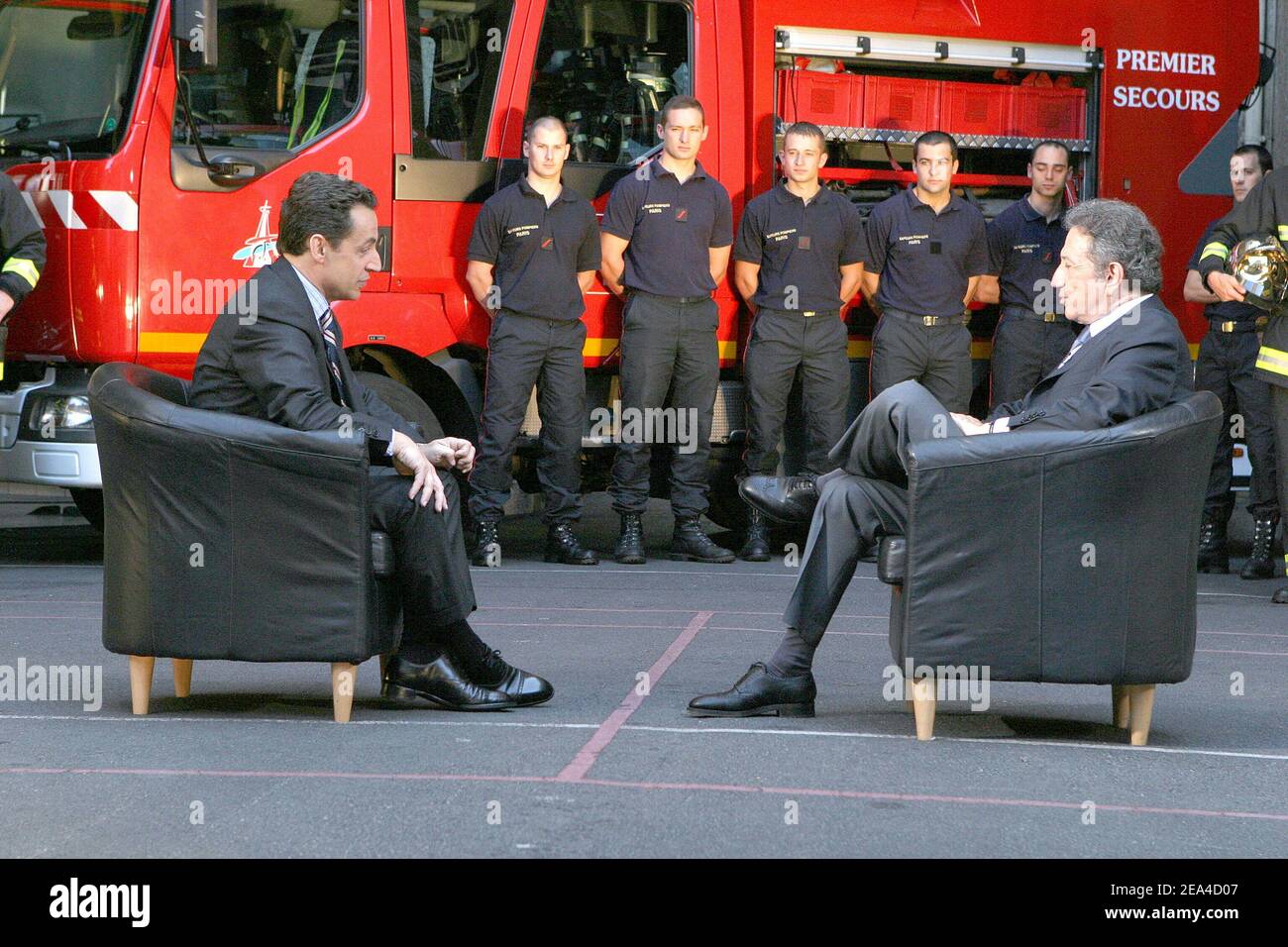EXCLUSIVE. French Interior Minister Nicolas Sarkozy (L) and TV ...