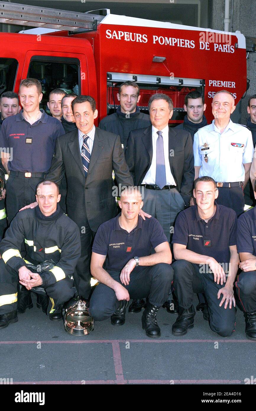EXCLUSIVE. French Interior Minister Nicolas Sarkozy (L) and TV ...