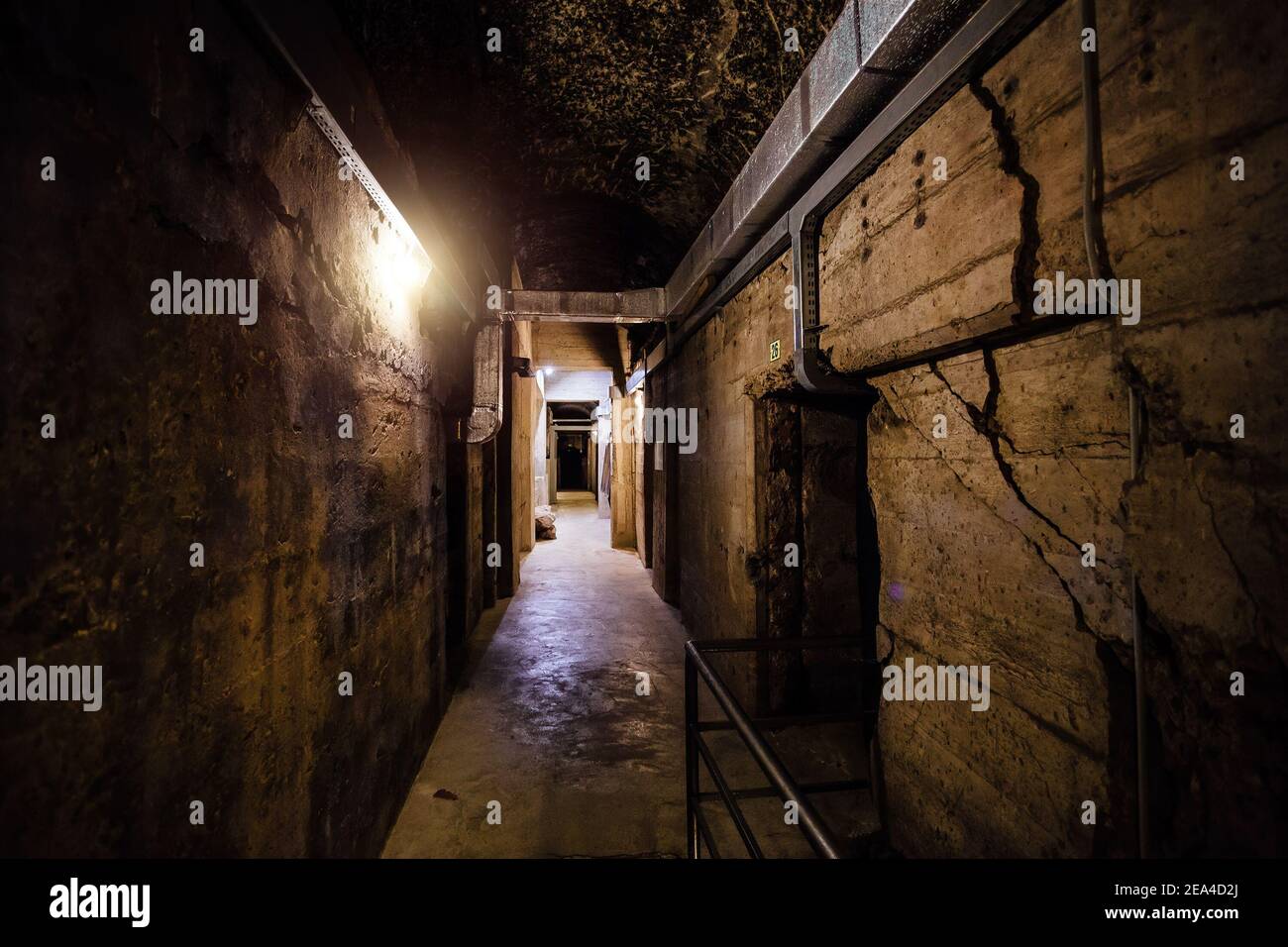 Dark creepy old corridor of underground bunker or prison Stock Photo ...