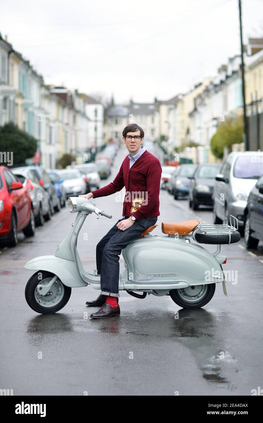 GREAT BRITAIN / England /Brighton /Man sitting on classic lambretta ...