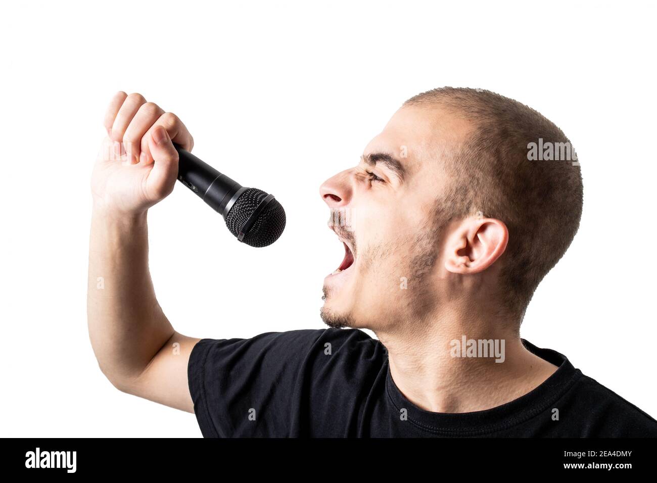 Portrait young man singing microphone hi-res stock photography and images - Alamy