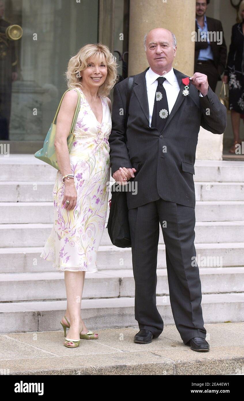 French cartoonist Georges Wolinski and his wife Maryse leave the Elysee ...