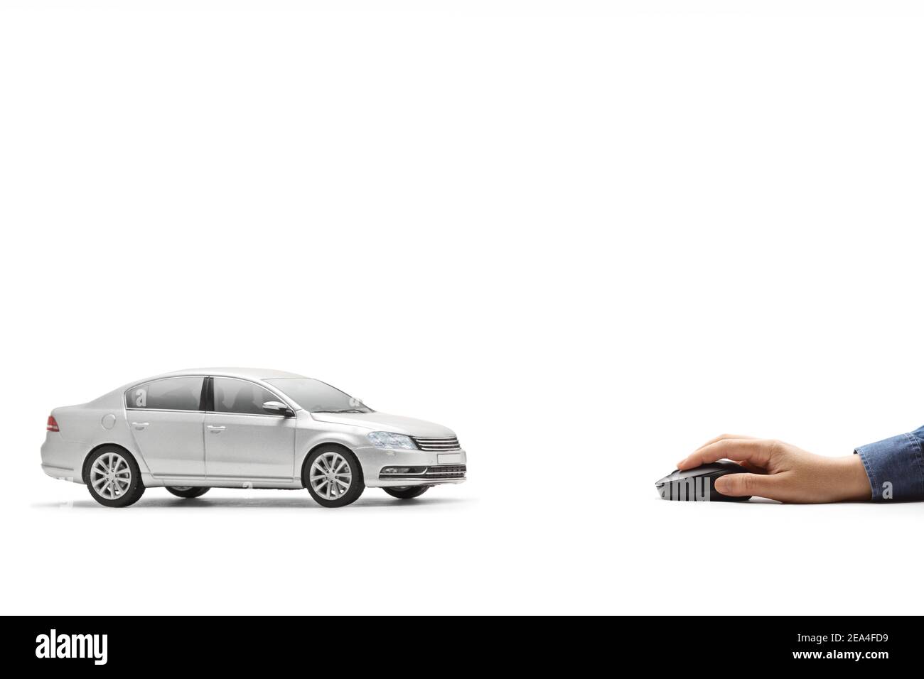 Hand clicking on a computer mouse and a silver car isolated on white ...