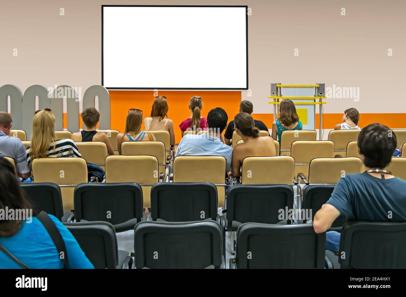 Audience in conference hall for shareholders meeting or seminar event ...
