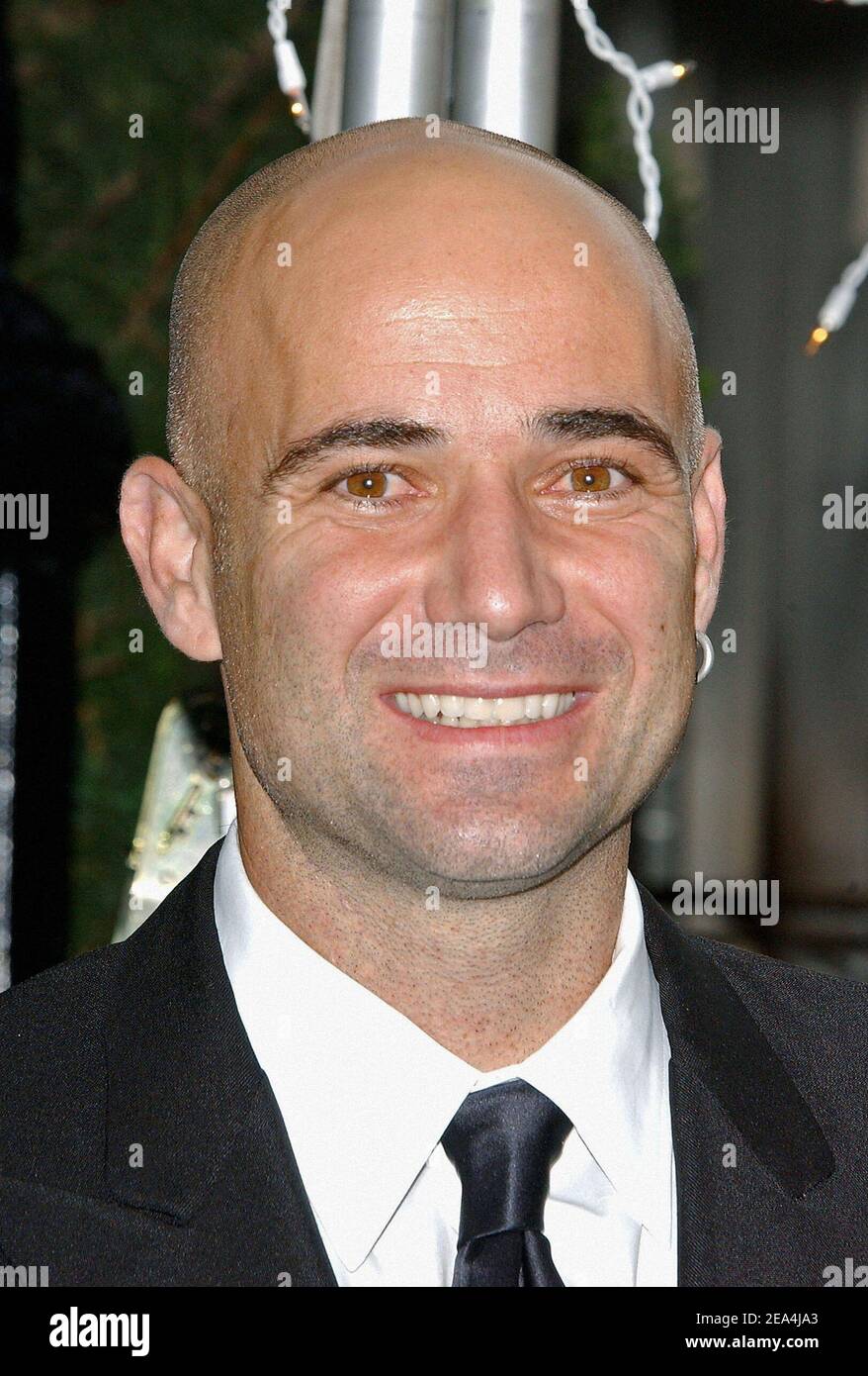 Andre Agassi arrives at Usher's fundraiser evening for his New Look ...